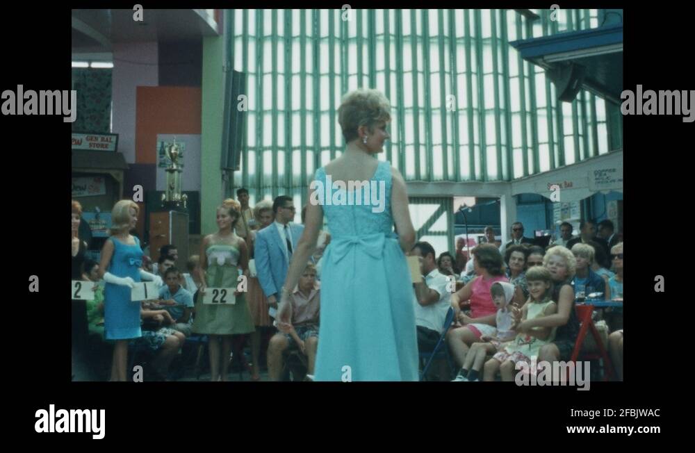 1960s: Beauty pageant contestants carry numbers across dance floor and ...