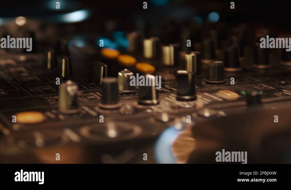DJ pult operation turning knobs and buttons Stock Video Footage - Alamy