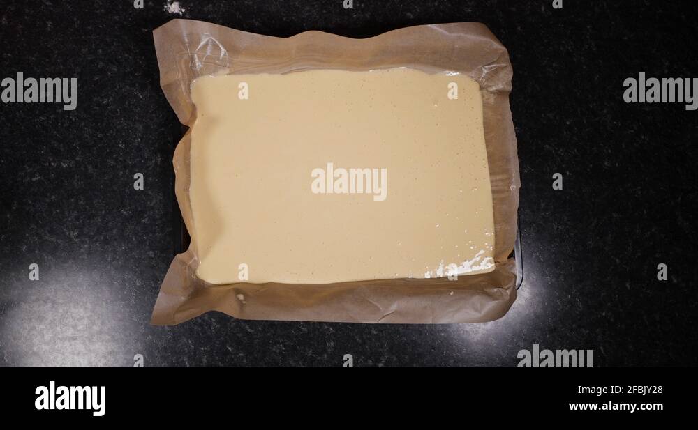 Reverse Shot Of Lady Showing Finished Raw Batter Ready To Be Put Into ...