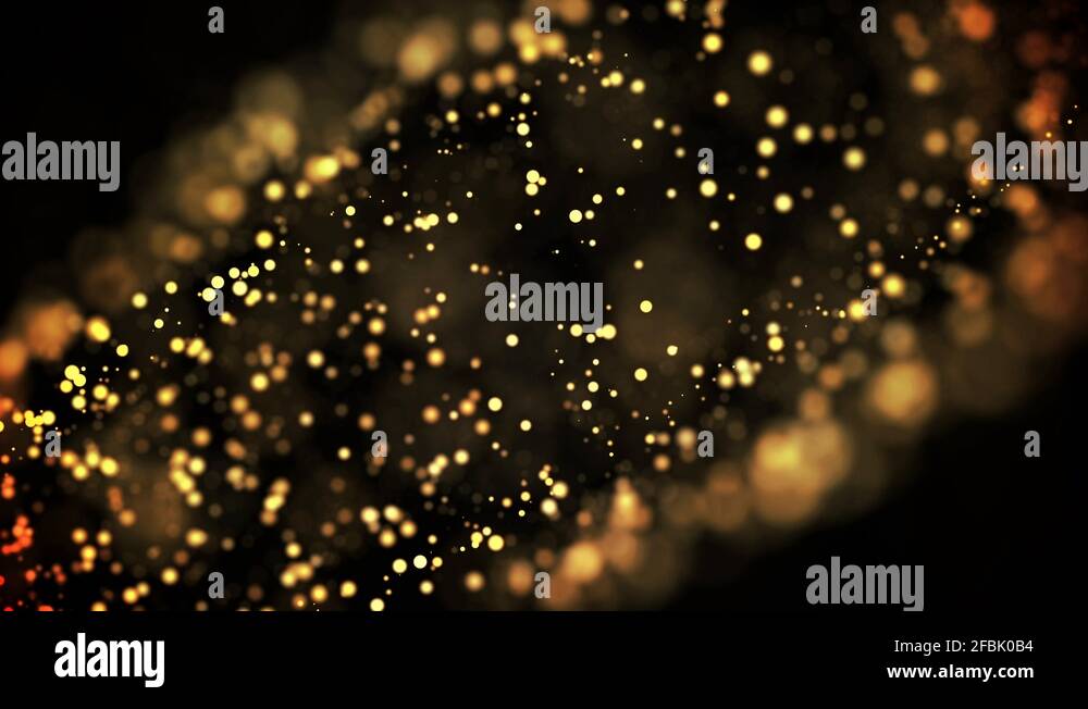 gold particles in liquid float and glisten. Background with glittering ...
