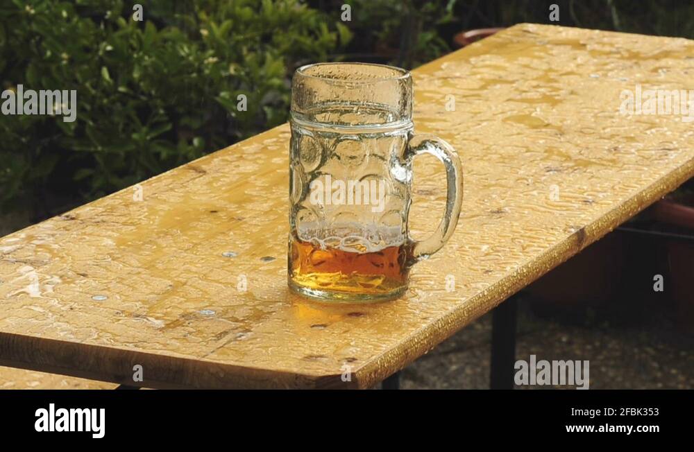 beer mug in rain Stock Video Footage - Alamy