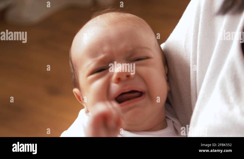 Mother holding crying baby Stock Videos & Footage - HD and 4K Video ...