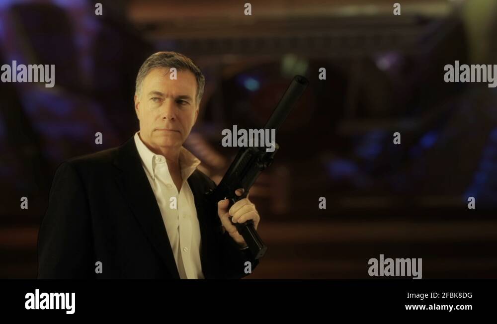 Agent to suit weapon Stock Videos & Footage - HD and 4K Video Clips - Alamy