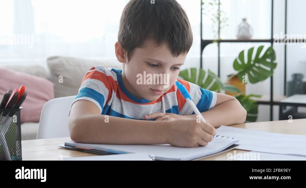 Boy thinking while studying Stock Videos & Footage - HD and 4K Video ...