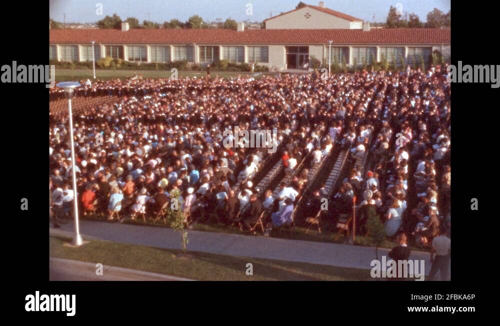 1950s: UNITED STATES: people attend graduation ceremony. Students in ...