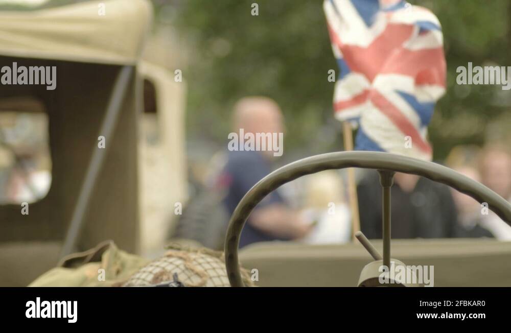 Rifle on army vehicle with Union Jack flying Stock Video Footage - Alamy