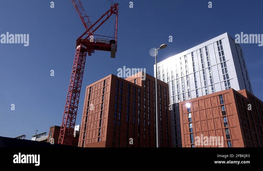 Coventry city centre modern buildings with people and cars England UK ...