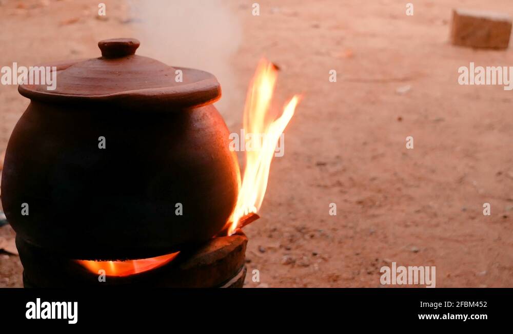 Clay pot on stove Stock Videos & Footage - HD and 4K Video Clips - Alamy