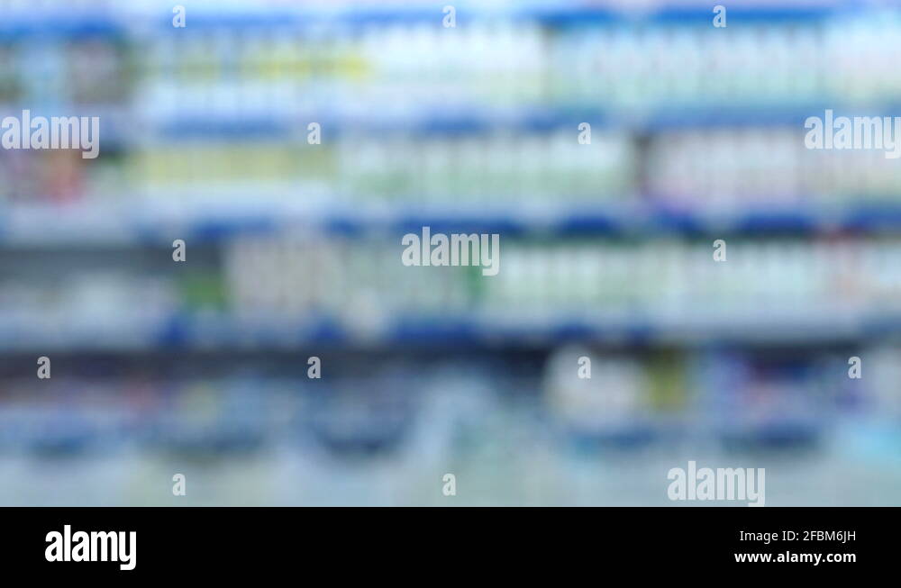 Abstract blur and bokeh supermarket and discount store interior for ...