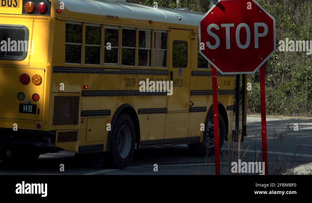 School Bus at Stop Sign Stock Video Footage - Alamy