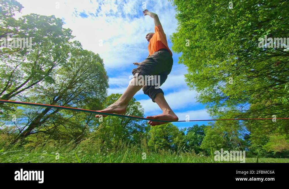 Slackline and park Stock Videos & Footage - HD and 4K Video Clips - Alamy