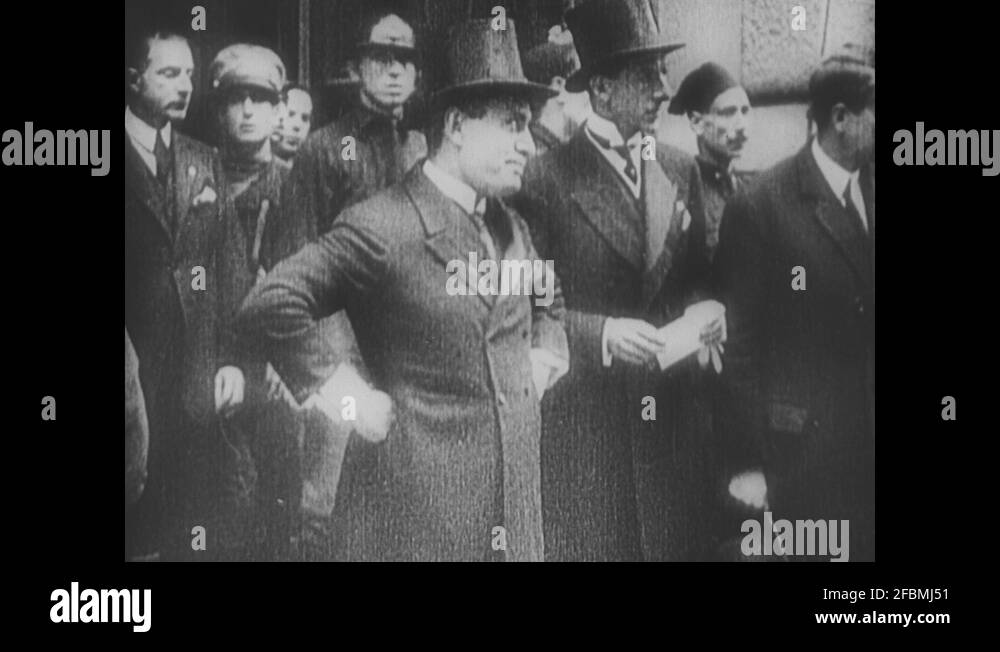Benito Mussolini poses and is saluted by a group of fascists Stock ...