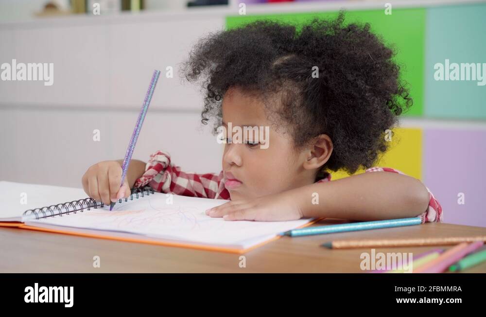 African kids drawing and do homework in classroom Stock Video Footage ...