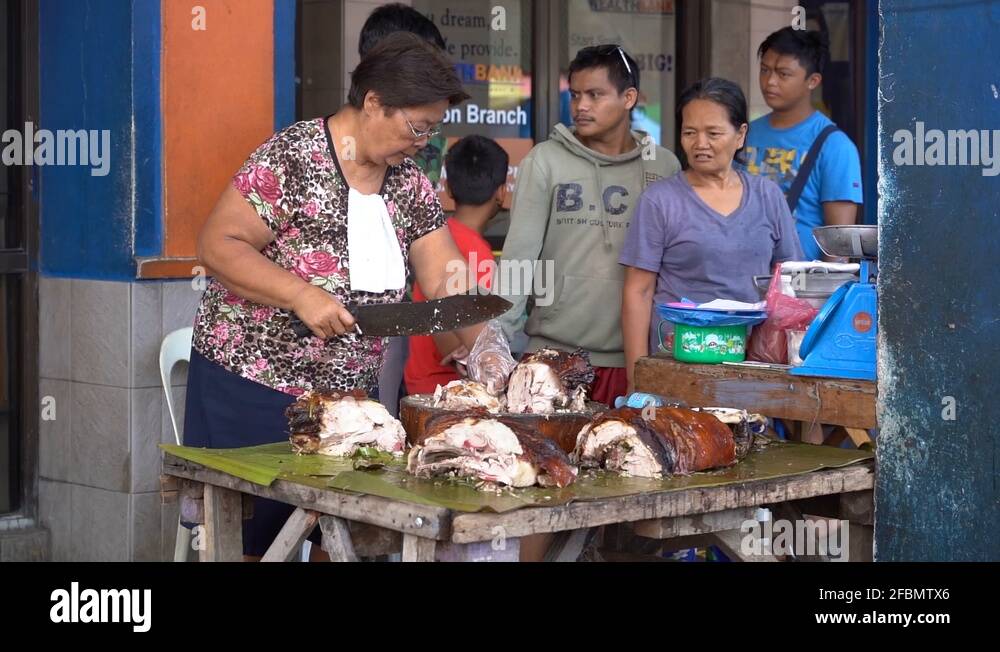 Filipino roasted pig Stock Videos & Footage - HD and 4K Video Clips - Alamy