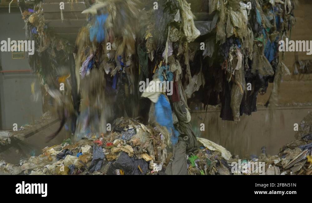 Crane depositing Garbage in an Industrial Dumpster. Waste Recycling ...