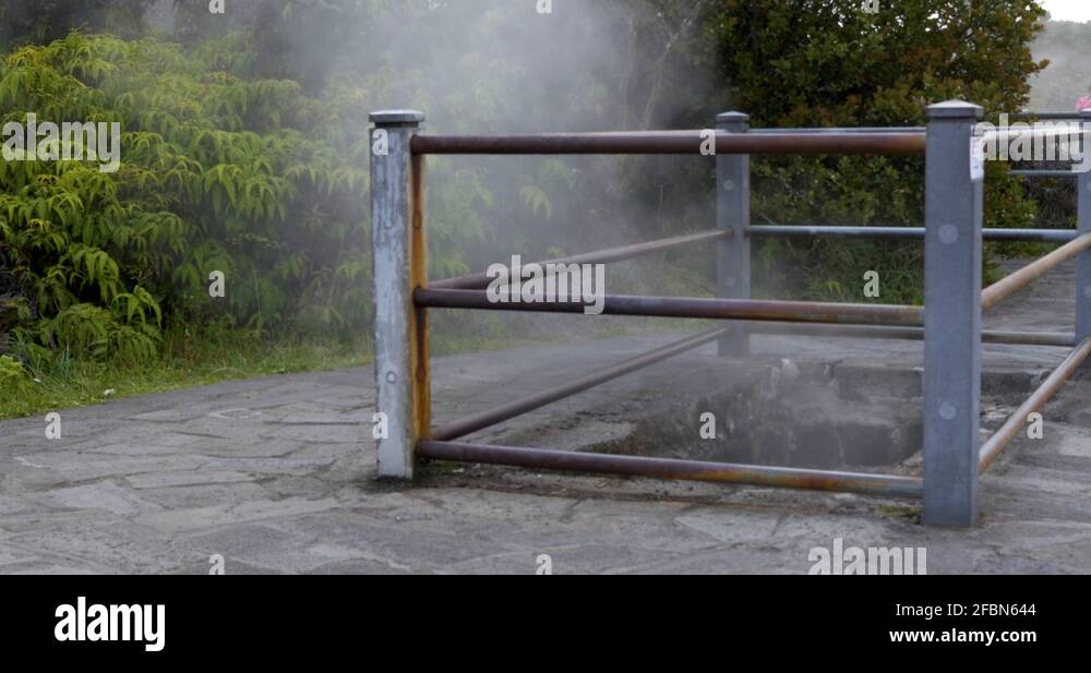 volcanic steam blowing upward and out of a vent in Hawaii's volcano ...