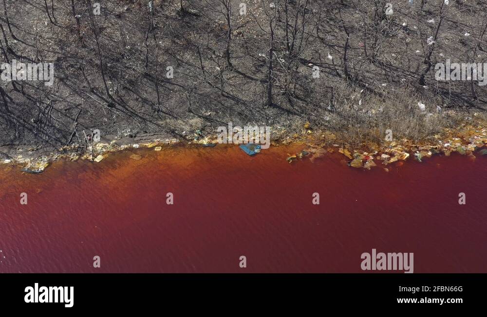 Polluted surface water with acid mine drainage AMD 4K drone video Stock ...