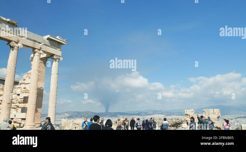 Acropolis hill people visiting the Erechtheion large smoke fire Stock ...