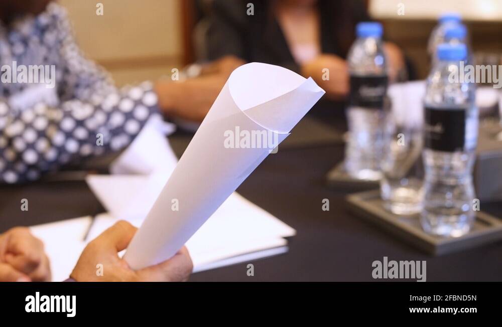 Hands holding sheet of paper Stock Videos & Footage - HD and 4K Video ...