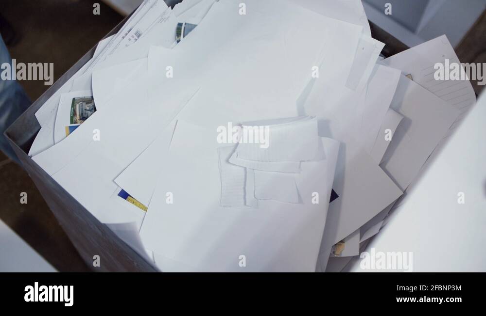 Overflowing trash can full of crumpled paper Stock Videos & Footage ...