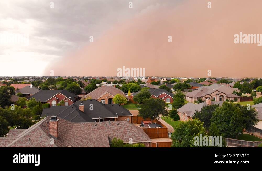 4K Ariel rising footage of a giant dust storm or haboob approaching a ...