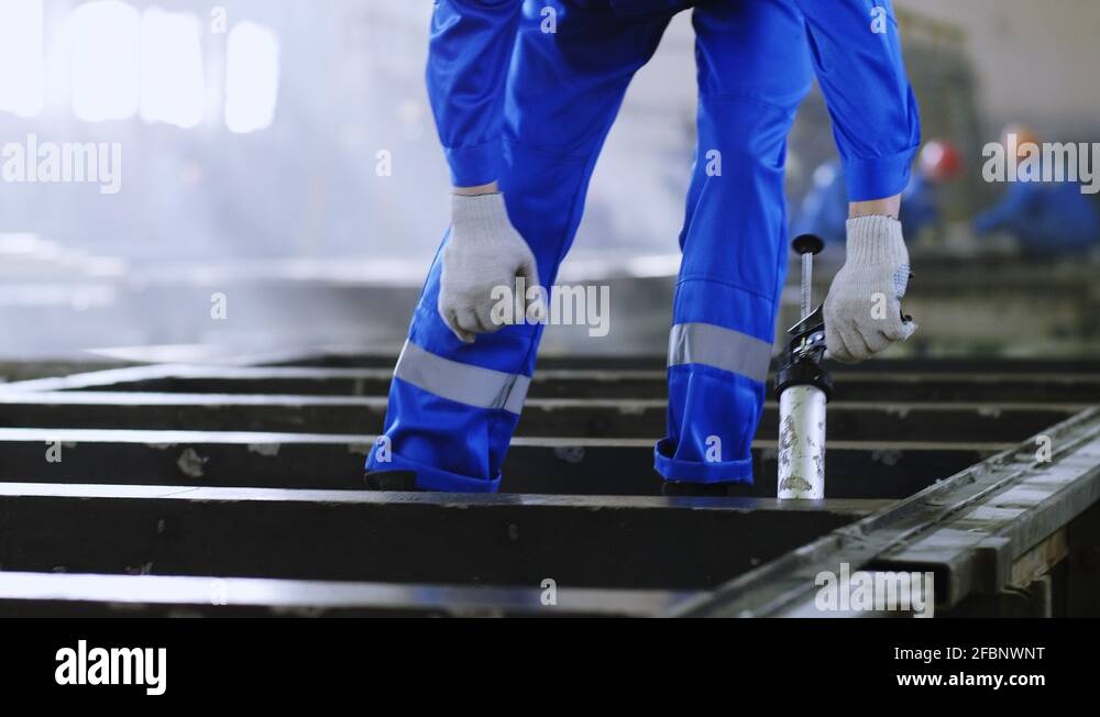 Using tool Stock Videos & Footage - HD and 4K Video Clips - Alamy