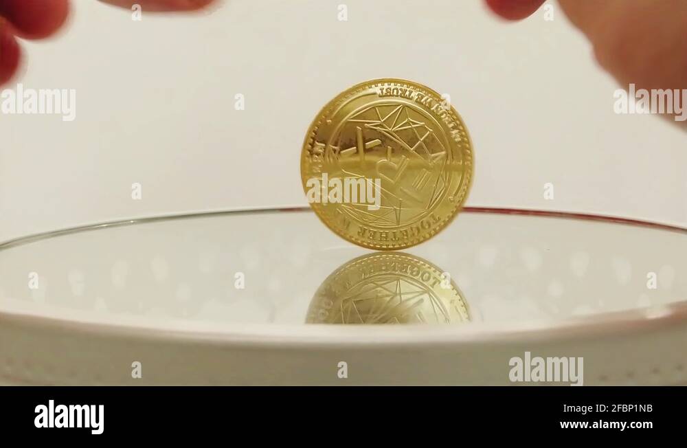 Tron (TRX) cryptocurrency coin flip and spinning on the glass pattern ...