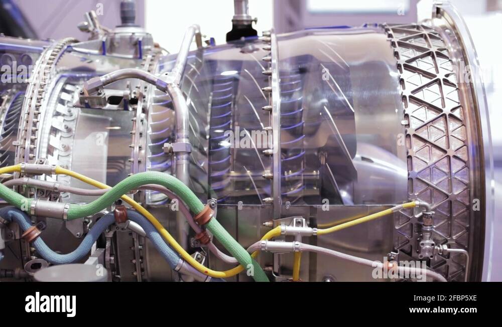 a close up of a jet engine without the case. you can look into the ...