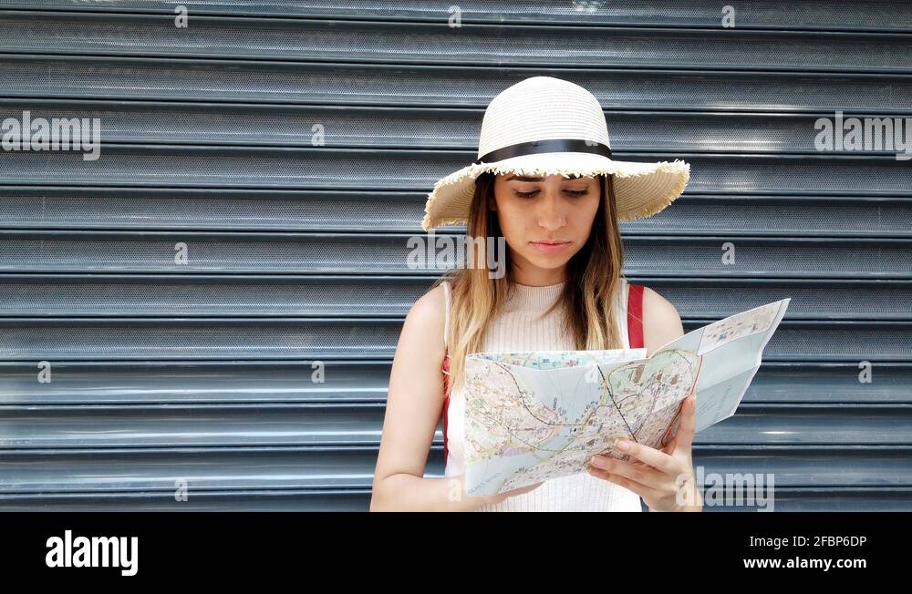 Young girl looks map Stock Videos & Footage - HD and 4K Video Clips - Alamy
