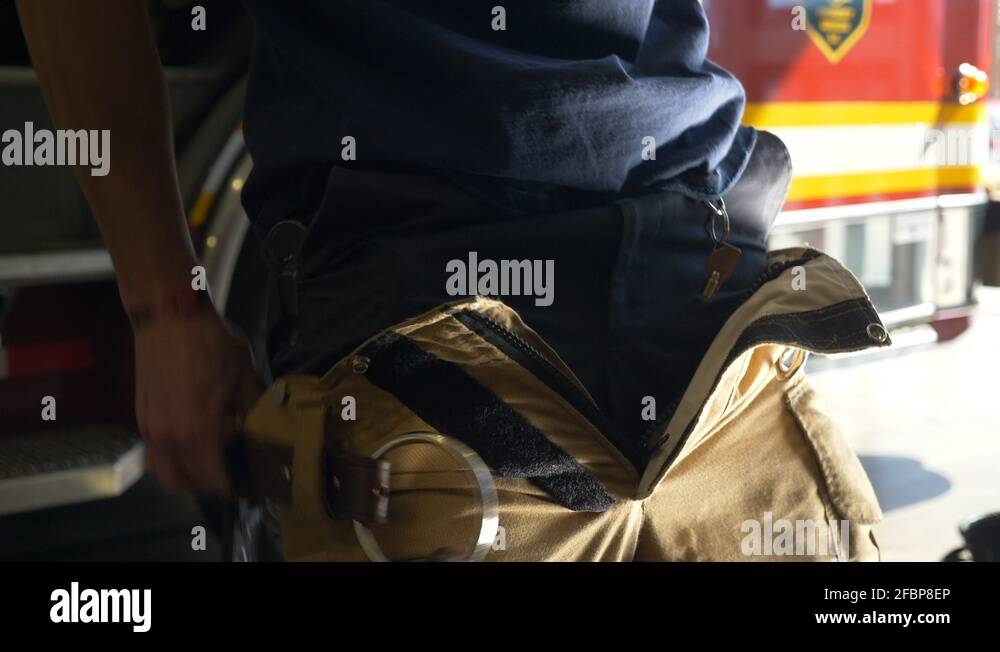 Firefighter puts on protective Stock Videos & Footage - HD and 4K Video Clips - Alamy
