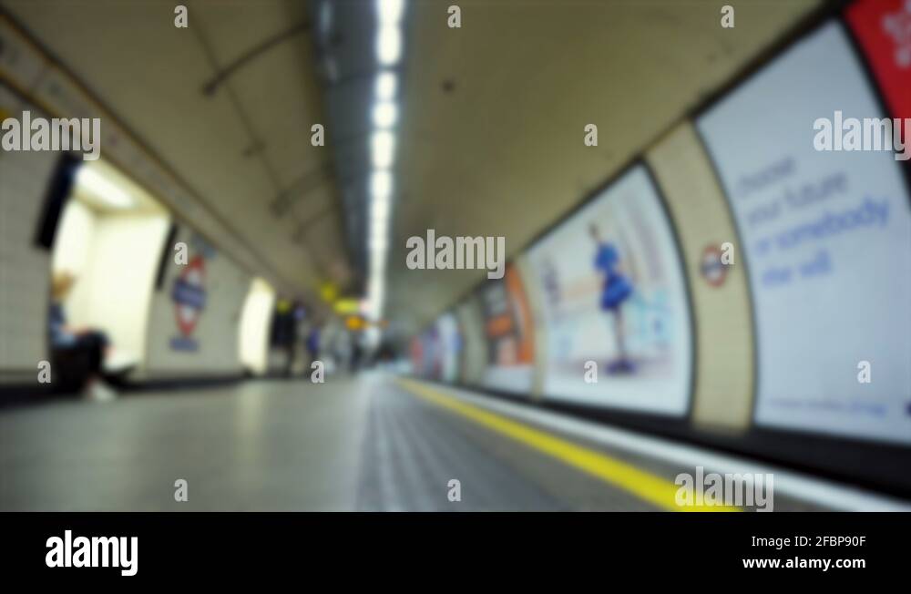 London Underground Train Arriving at Station and Doors Opening Stock ...