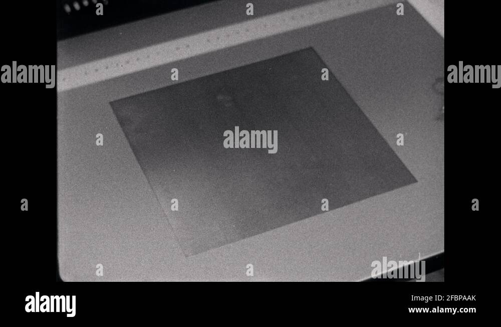 1960s: Graphic input tablet at base of computer monitor scope. Stylus ...