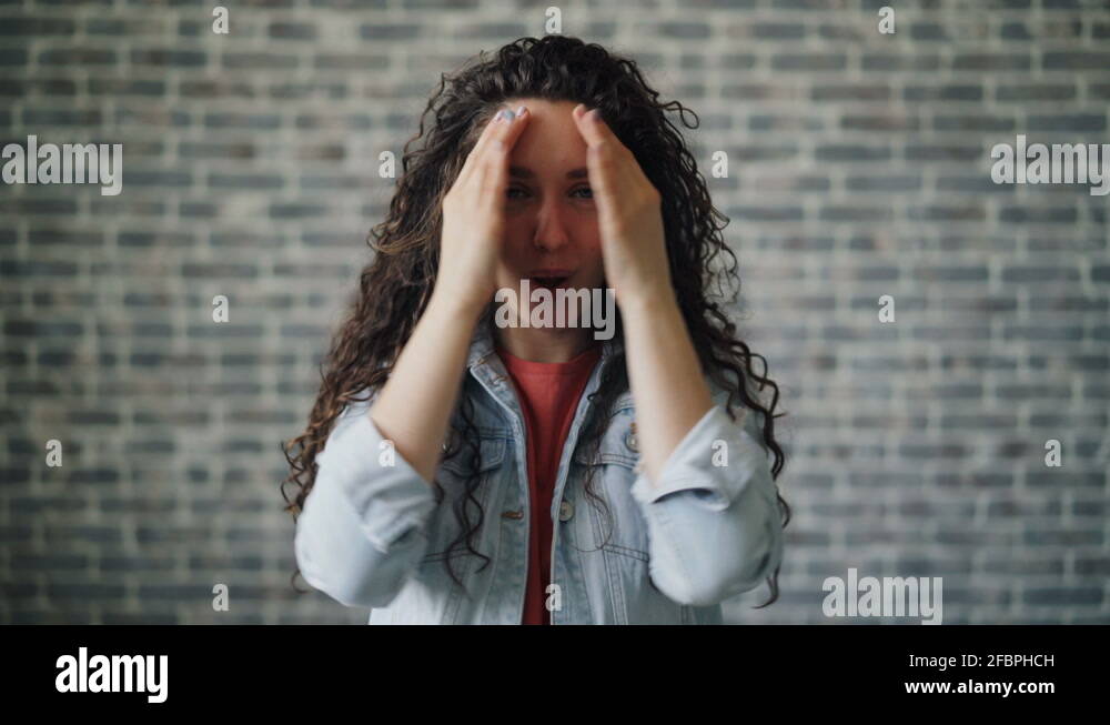 Student hiding face Stock Videos & Footage - HD and 4K Video Clips - Alamy