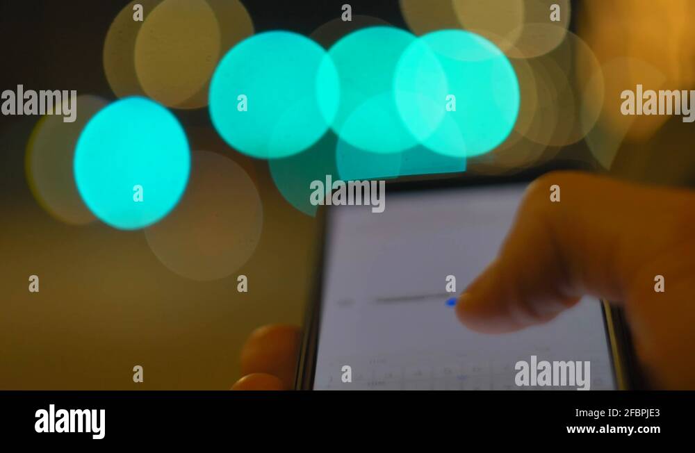 Typing on Smartphone Touchscreen Keyboard on Traffic Lights Bokeh ...