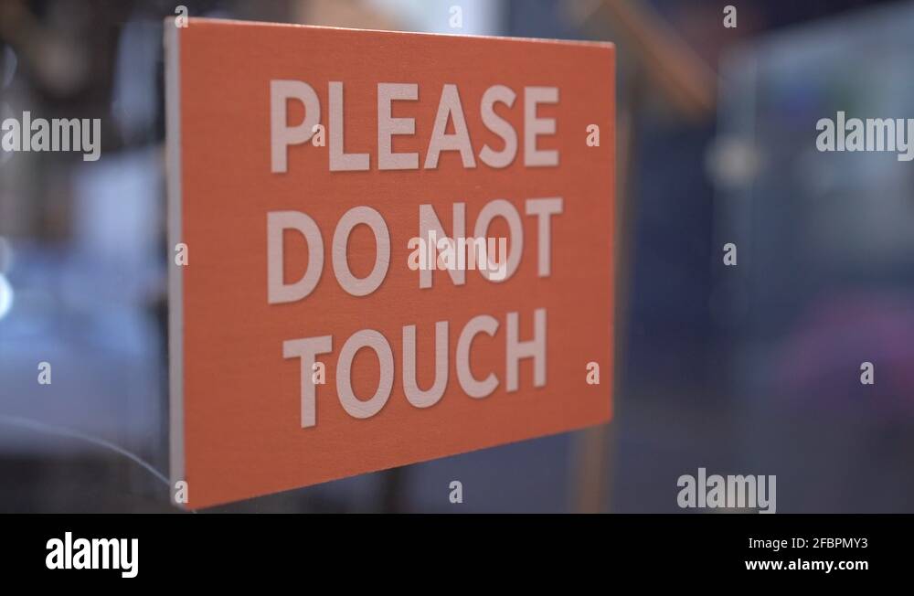 Please do not touch sign on glass casing of museum display 4k Stock ...