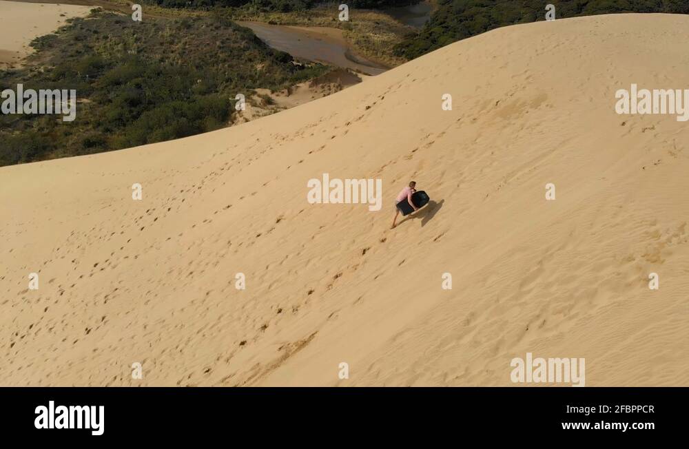 Carrying body board Stock Videos & Footage - HD and 4K Video Clips - Alamy