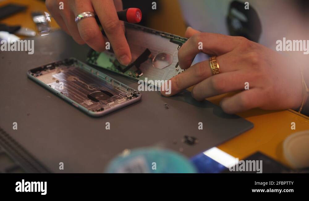 Mobile phone repair Stock Videos & Footage - HD and 4K Video Clips - Alamy