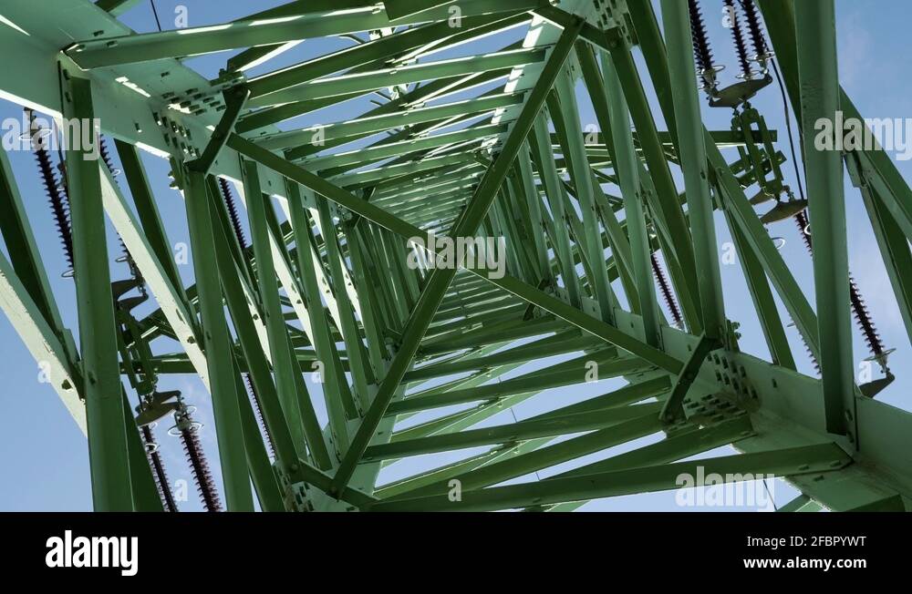 High voltage pylon and its construction from inside - low angle shot ...
