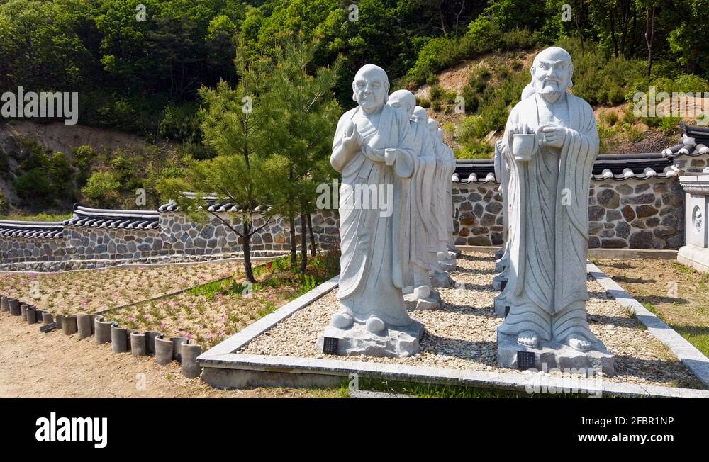 Stone monks statues Stock Videos & Footage - HD and 4K Video Clips - Alamy
