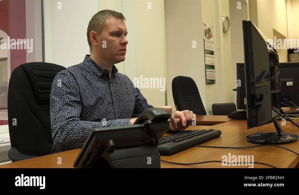 A man in an office Stock Videos & Footage - HD and 4K Video Clips - Alamy