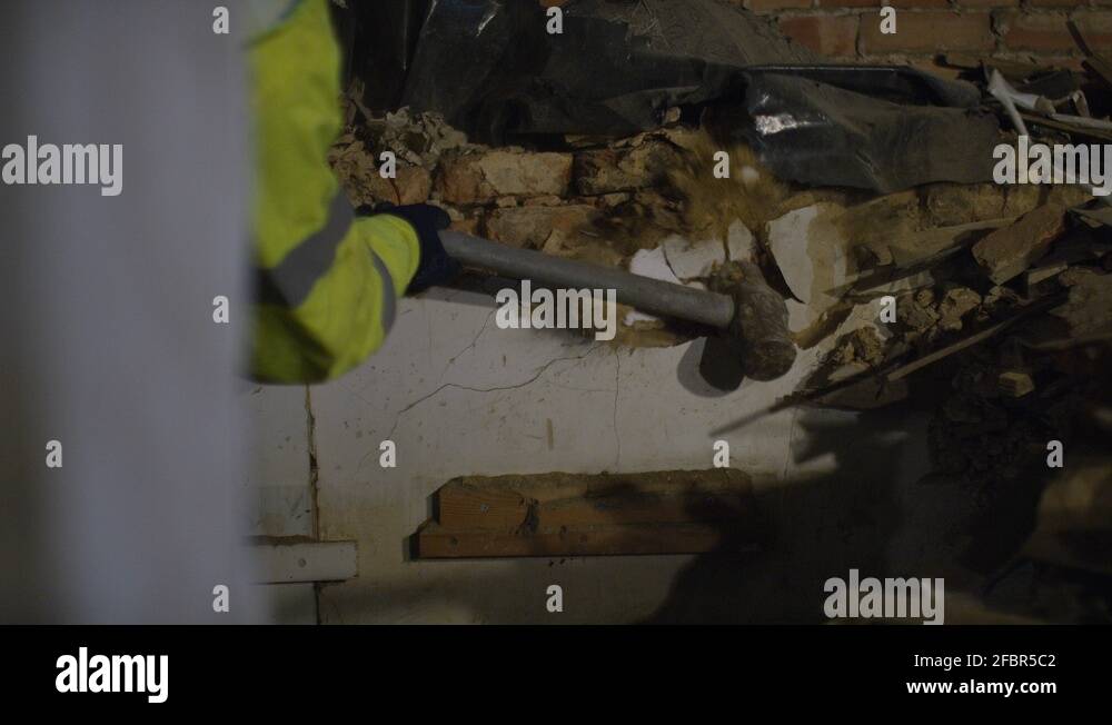 Man bricks falling wall Stock Videos & Footage - HD and 4K Video Clips ...
