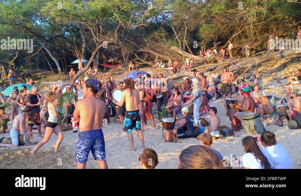 Typical Sunday with a crowd of people dancing goodbye to the sun on the ...