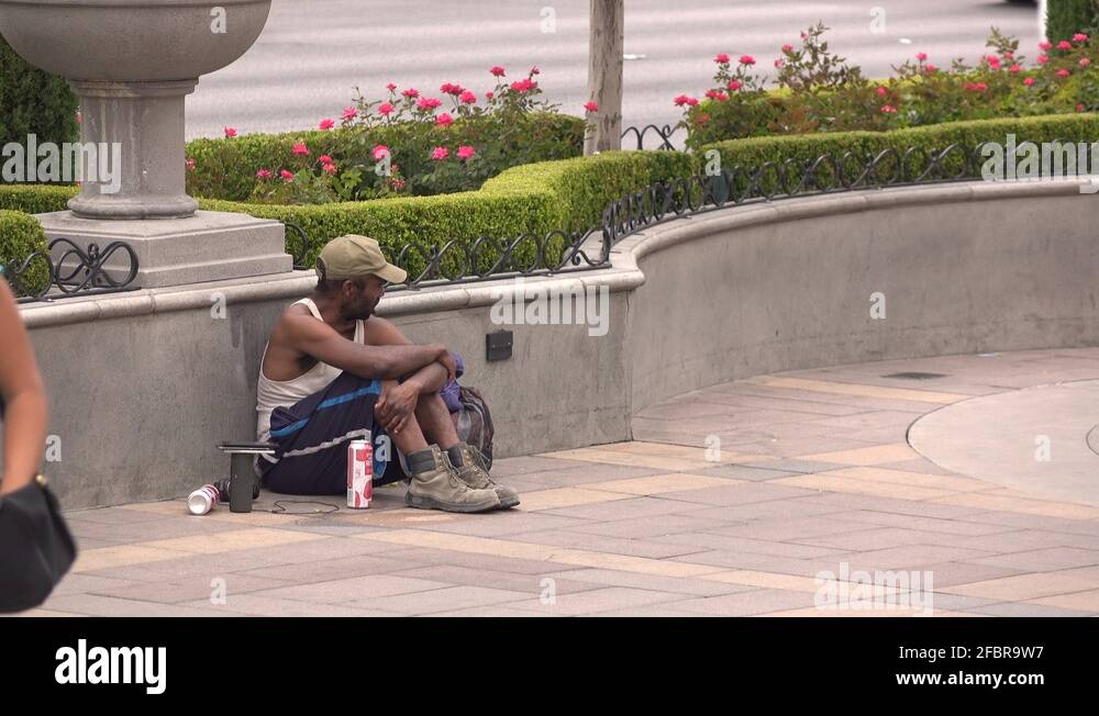 Homeless person sitting street backpack Stock Videos & Footage - HD and ...