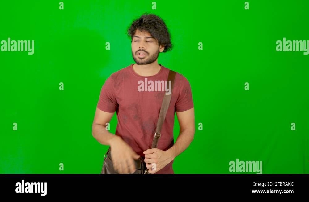 Indian guy questioning himself with green screen green background Stock ...