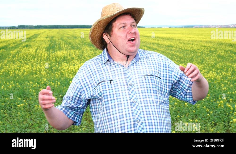 Amazed farmer, so shocked, extremely happy, with wide open mouth in the ...