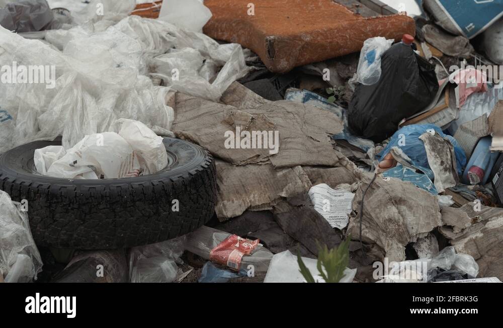 Garbage dump, various trash and waste material, environmental pollution ...