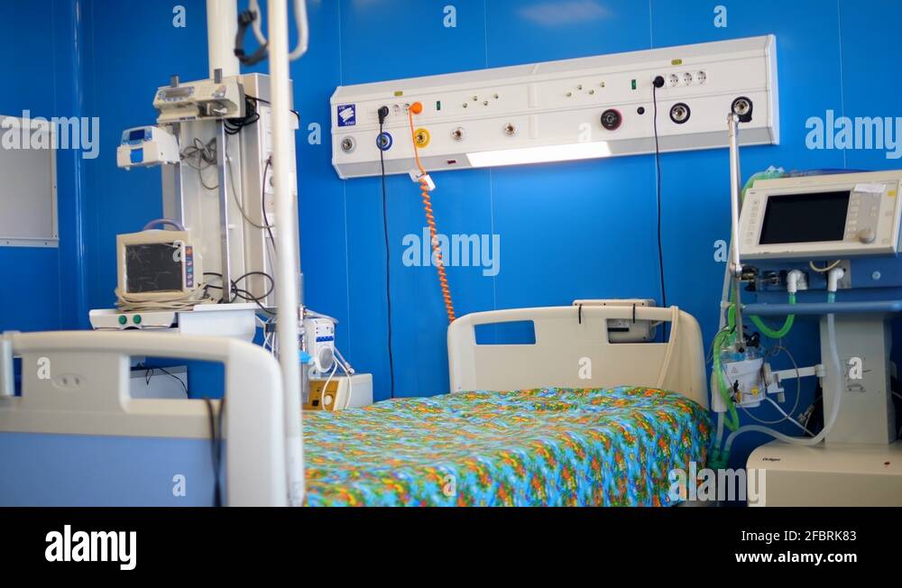 A bed and medical devices in a hospital ward Stock Video Footage - Alamy