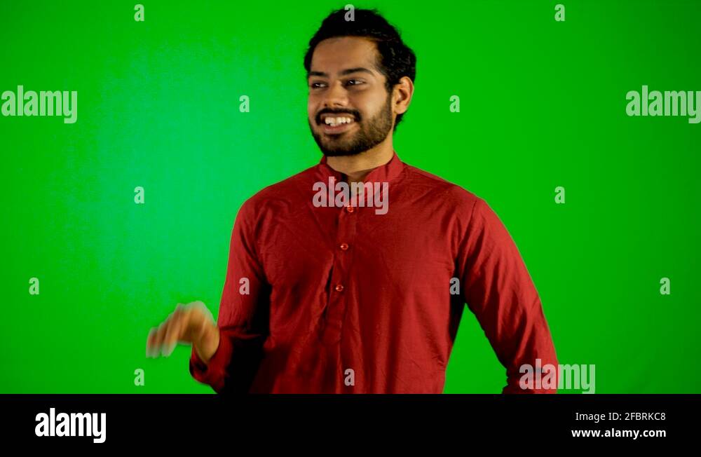 Indian guy say hello to girl with green screen . guy say hello to ...