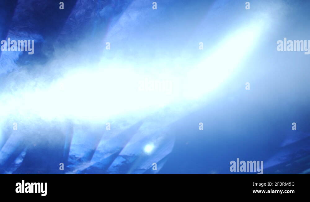 Laser show in a nightclub under the open sky. Laser beams and strobe ...