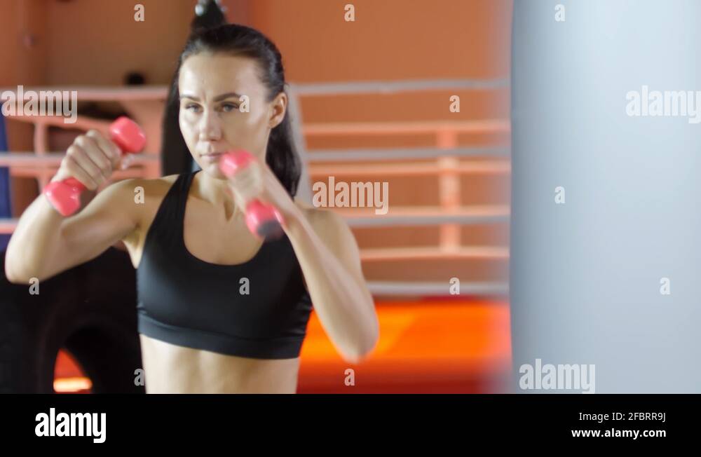 Female boxer doing dumbbell punches Stock Videos & Footage - HD and 4K ...